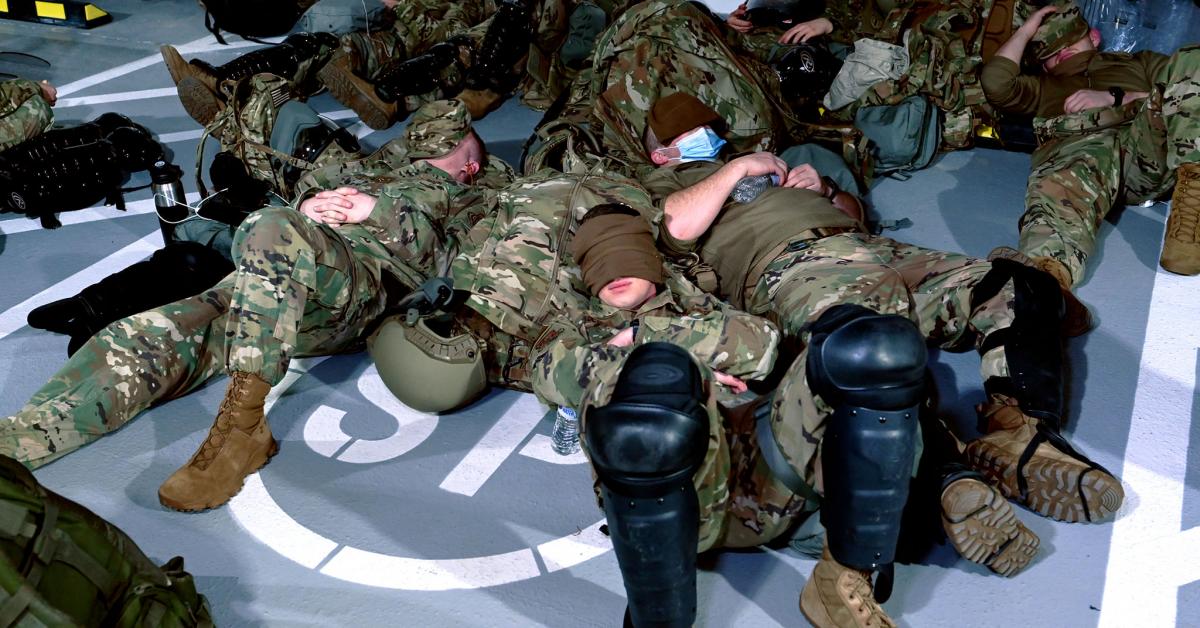 Guard troops forced to leave Capitol building, rest in parking garage ...