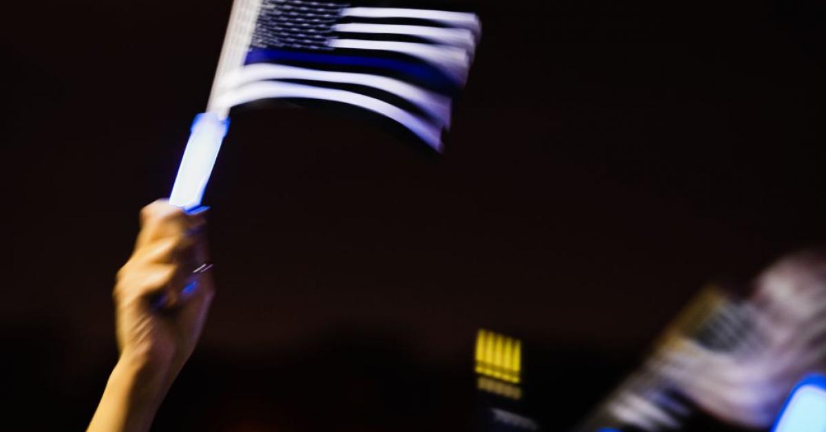 High school football team displays Thin Blue Line flag despite ban ...