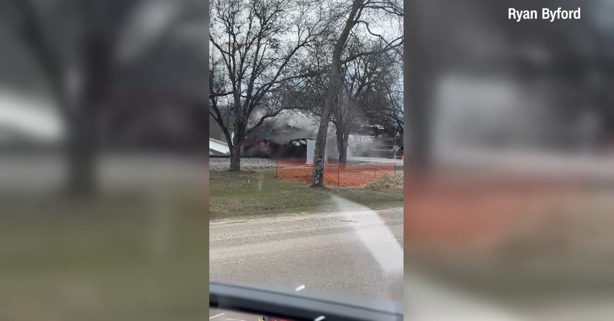 A freight train derails after slamming into a truck | Just The News