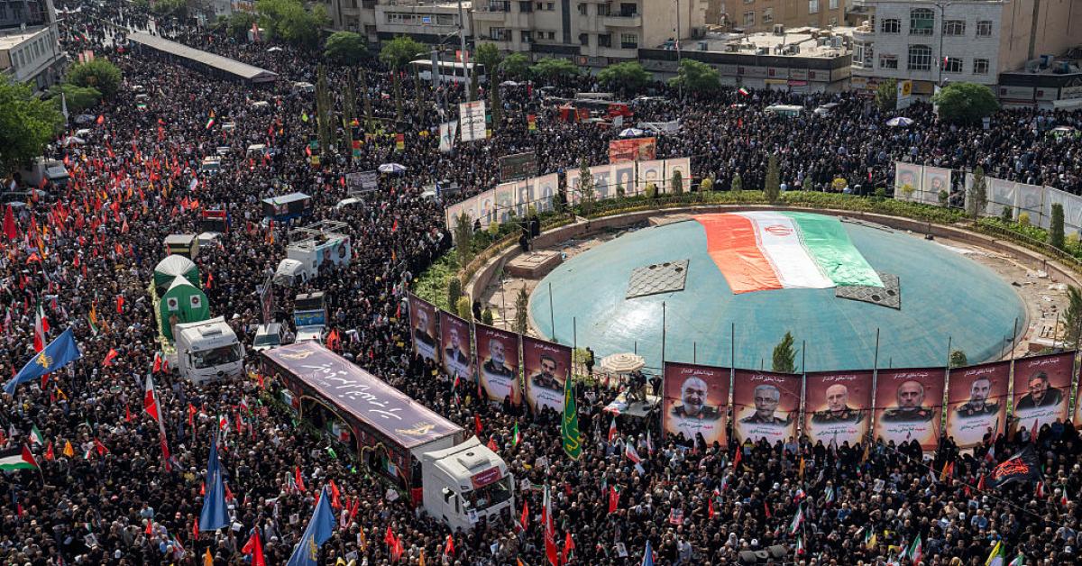 Thousands attend public funeral for top Iranian commanders killed in ...